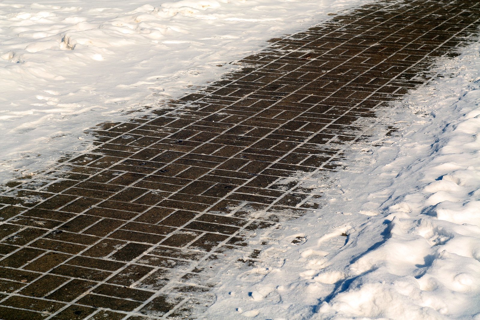 The Best Ways to Keep Brick Steps and Walkways Ice-Free This Winter