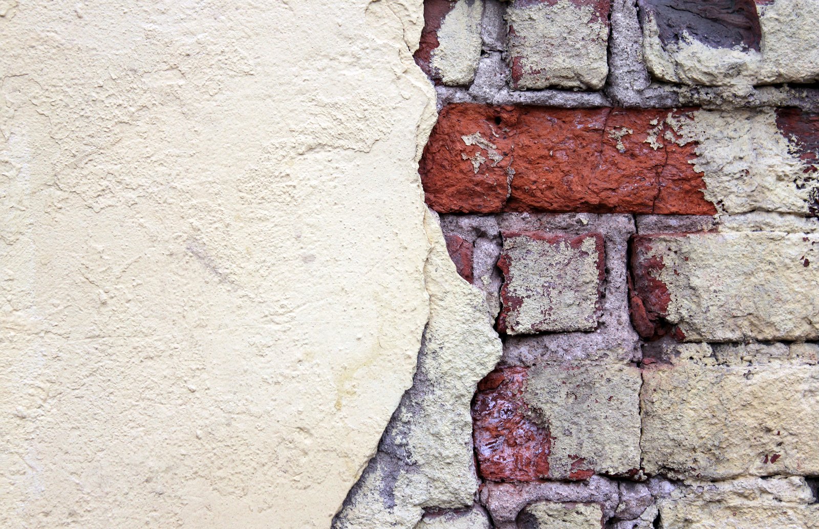 Removing Stucco to Expose Original Brick
